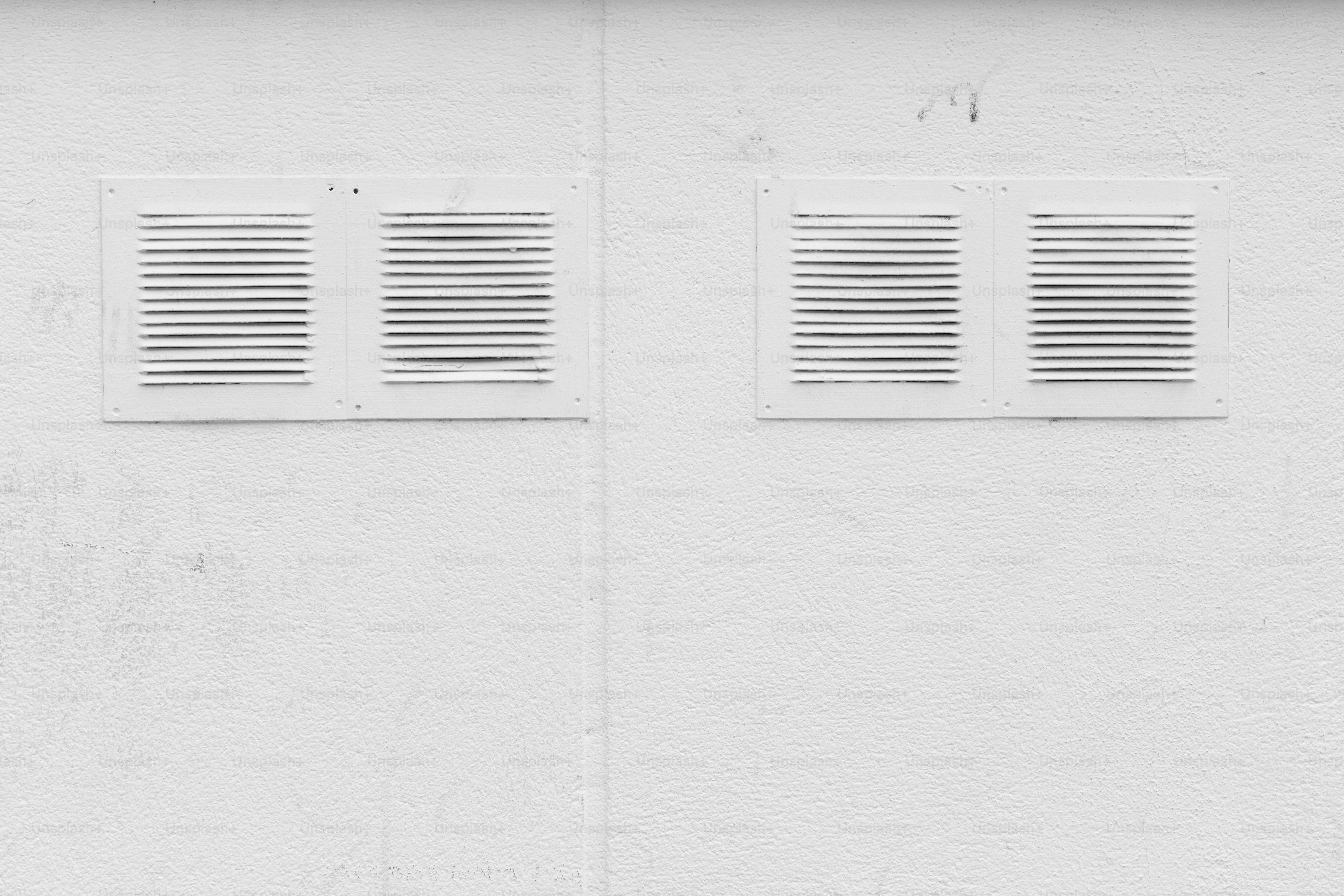 Two white rectangular vents on a plain white wall. photo – Texture ...