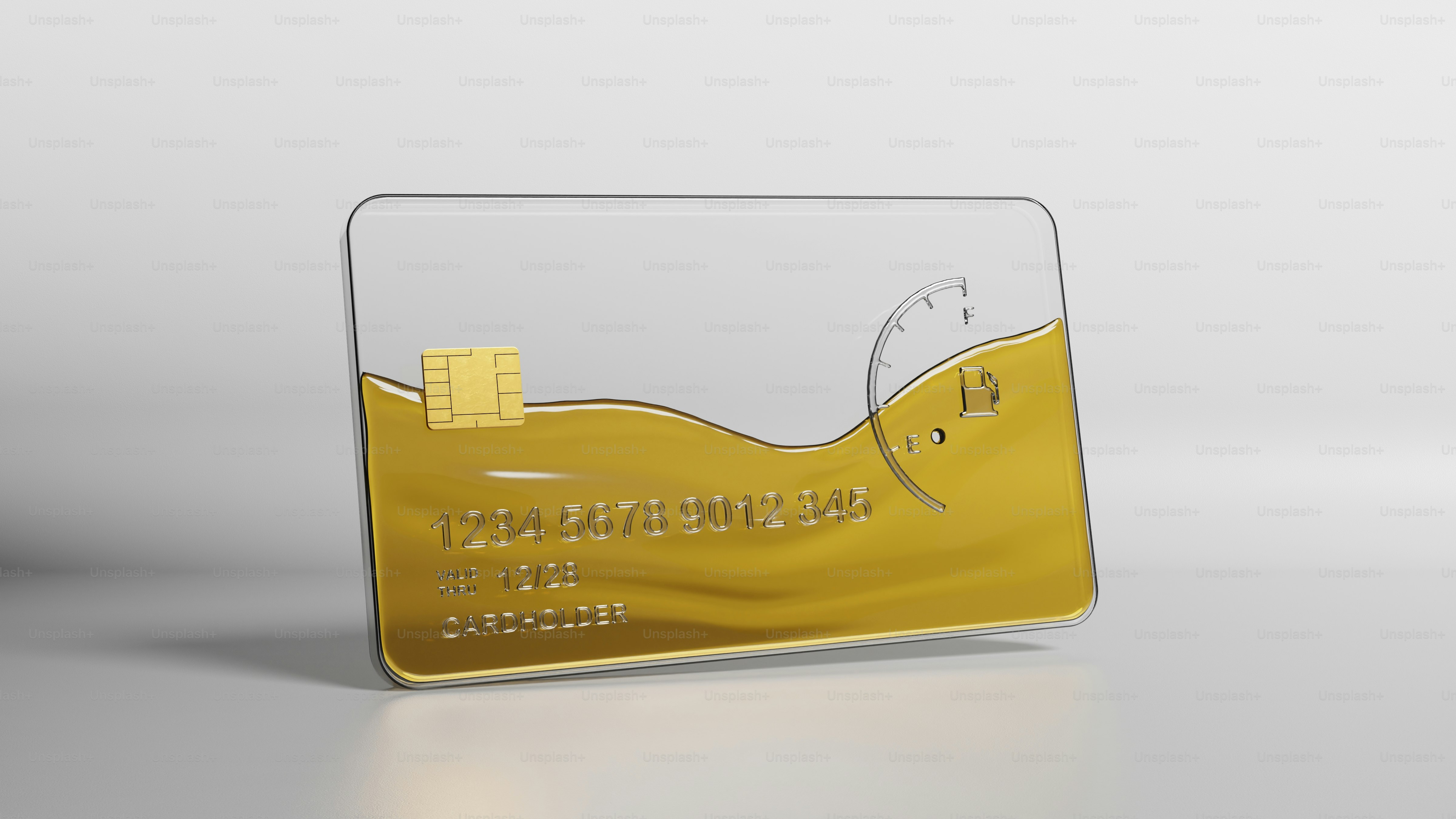 A credit card with a golden liquid design and microchip. photo – Money ...