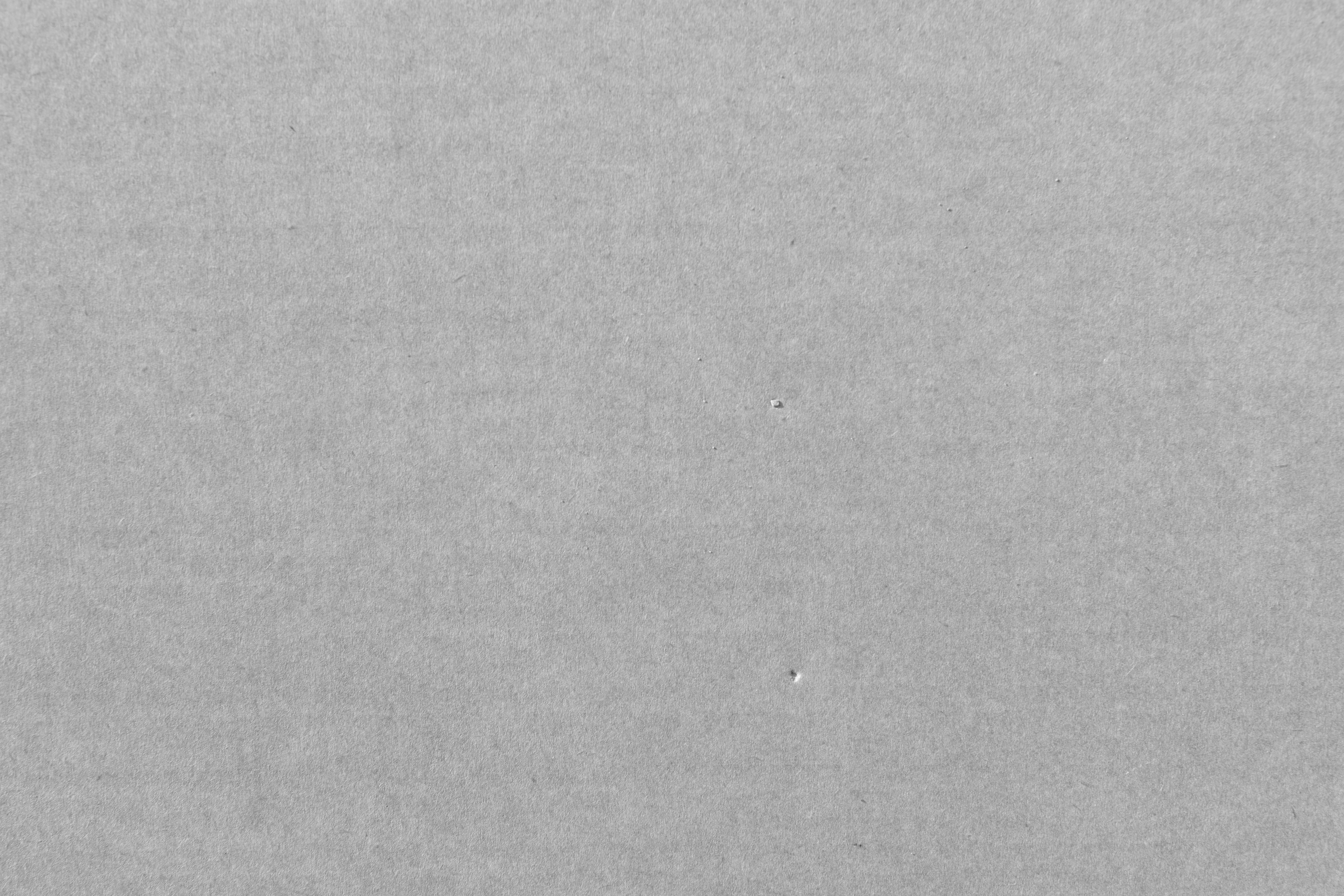 A solid gray background with subtle texture. photo – Wallpaper Image on ...