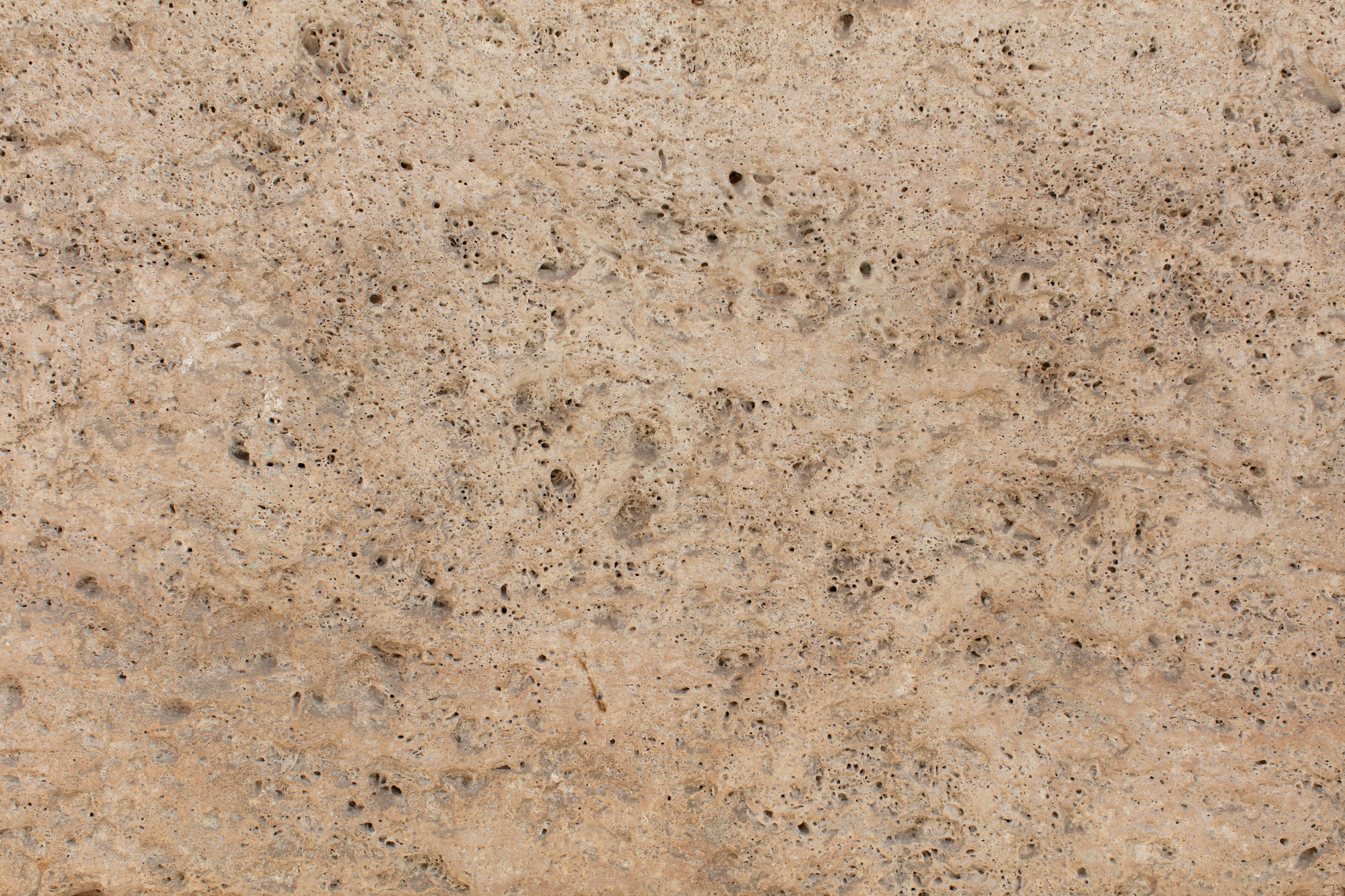 Rough grey stone surface with cracks and uneven texture. photo ...
