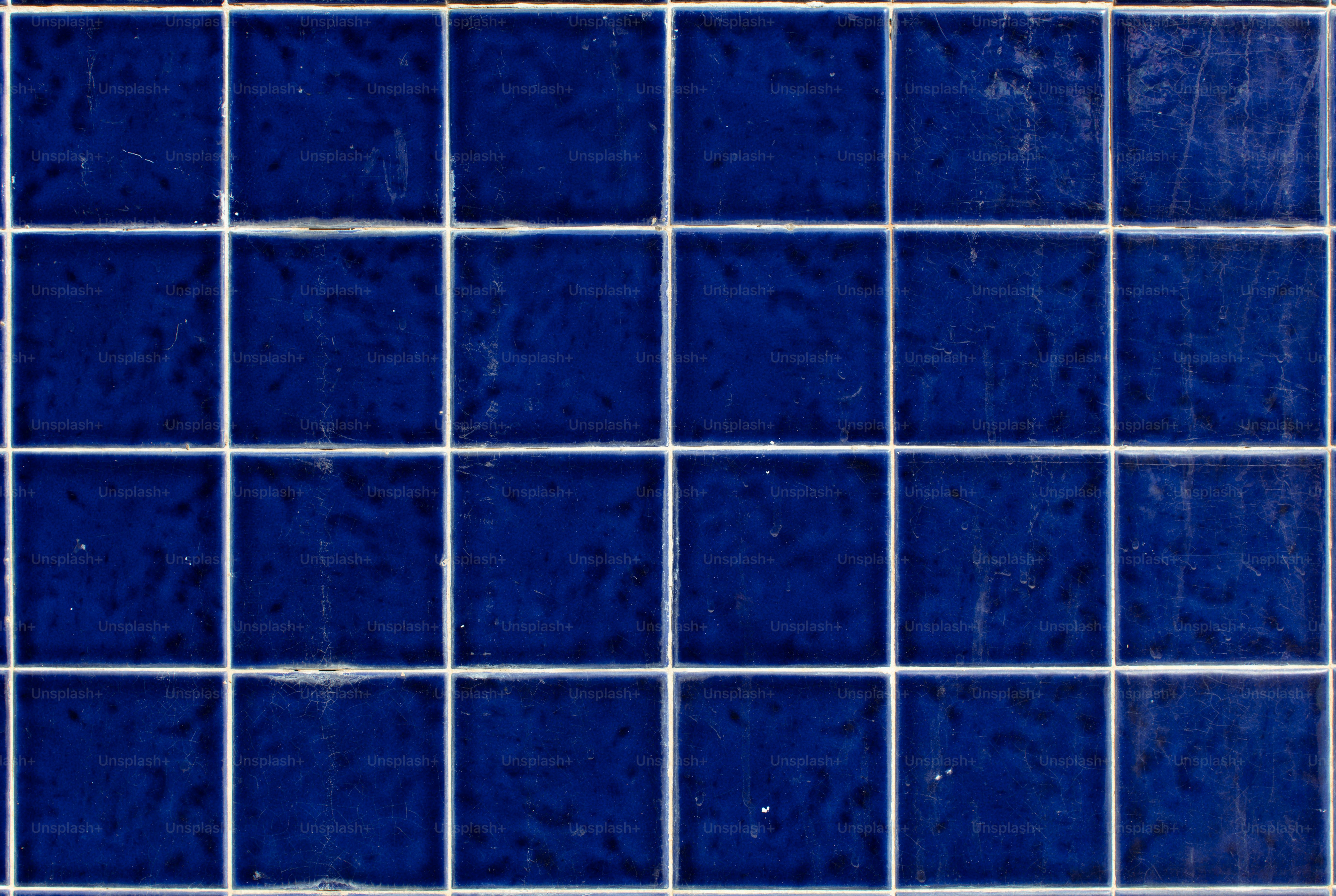 Dark blue square tiles with white grout lines. photo – Wallpaper Image ...