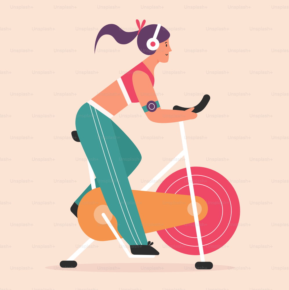 Young woman cycling on stationary bike in gym of sport club or home ...